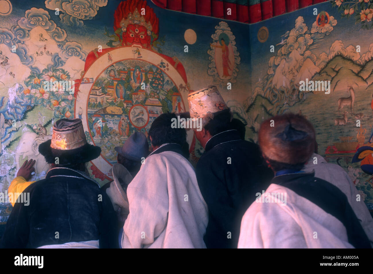 Tibetan men examine a mural Shigatse Tibet Stock Photo - Alamy