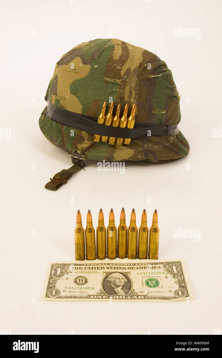 helmet bullets and money USA Marine helmet Stock Photo - Alamy