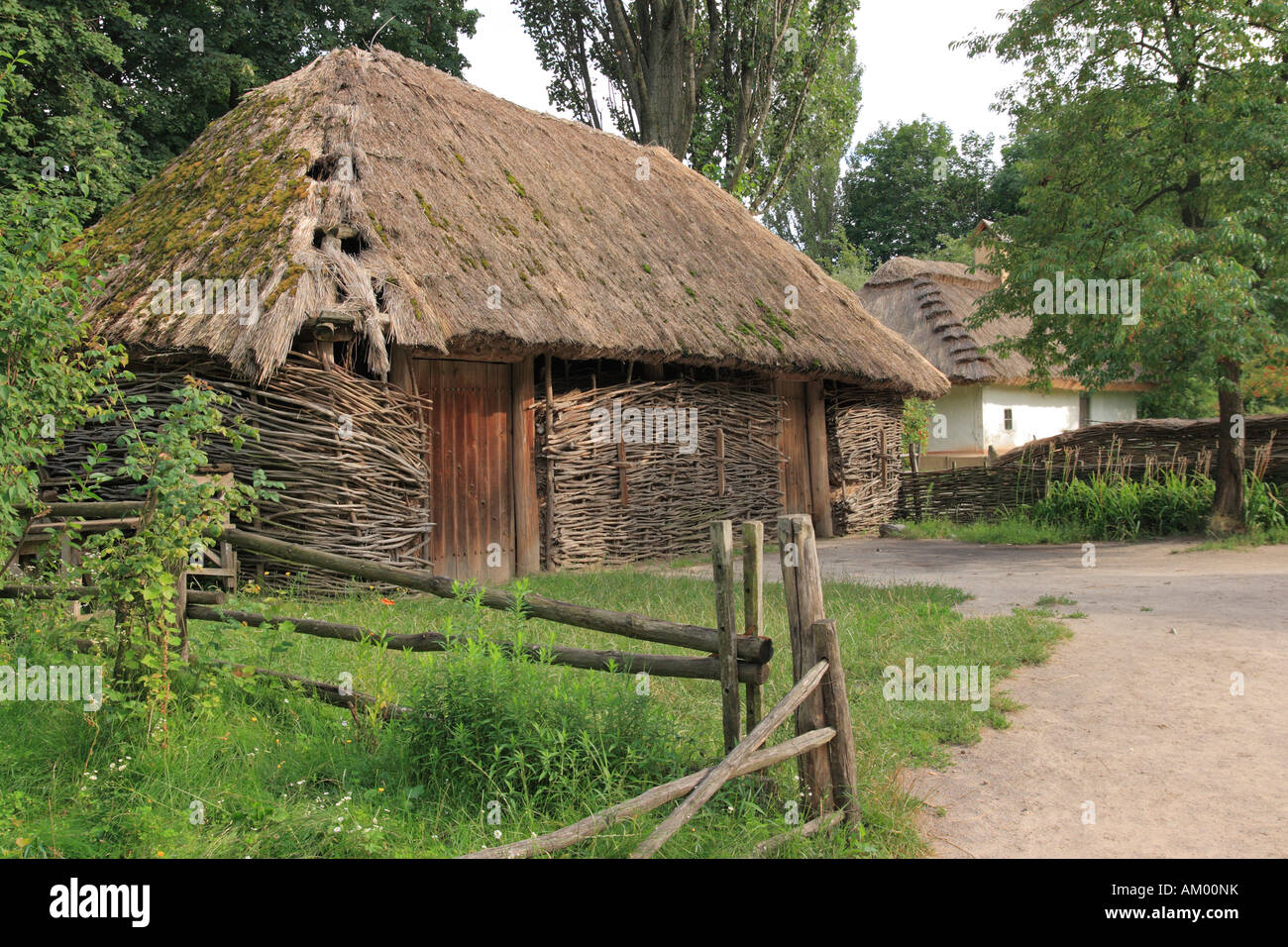 old wicker shed with thatch roof on historical country homestead Stock ...