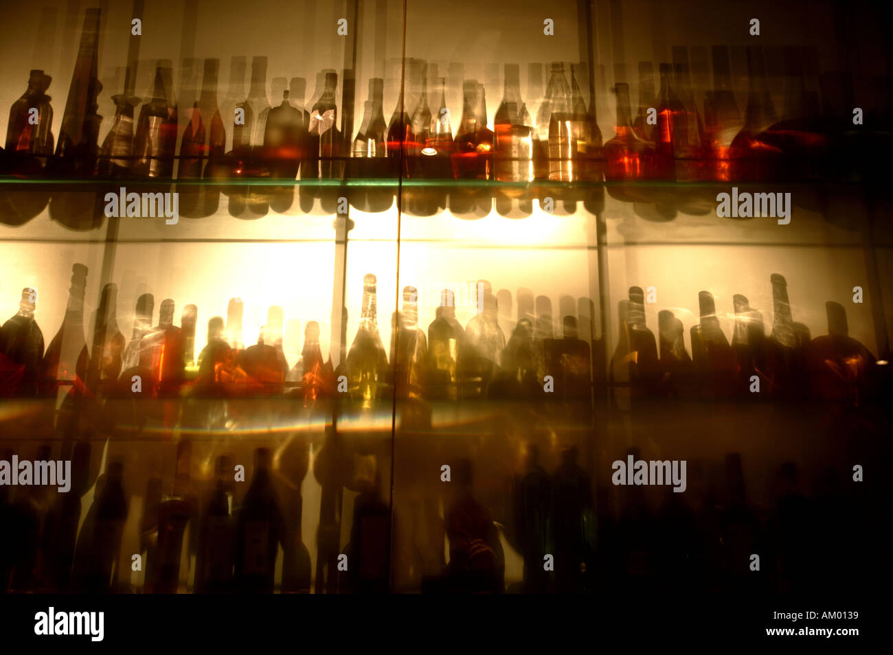 Bottles on the back of a bar Stock Photo - Alamy