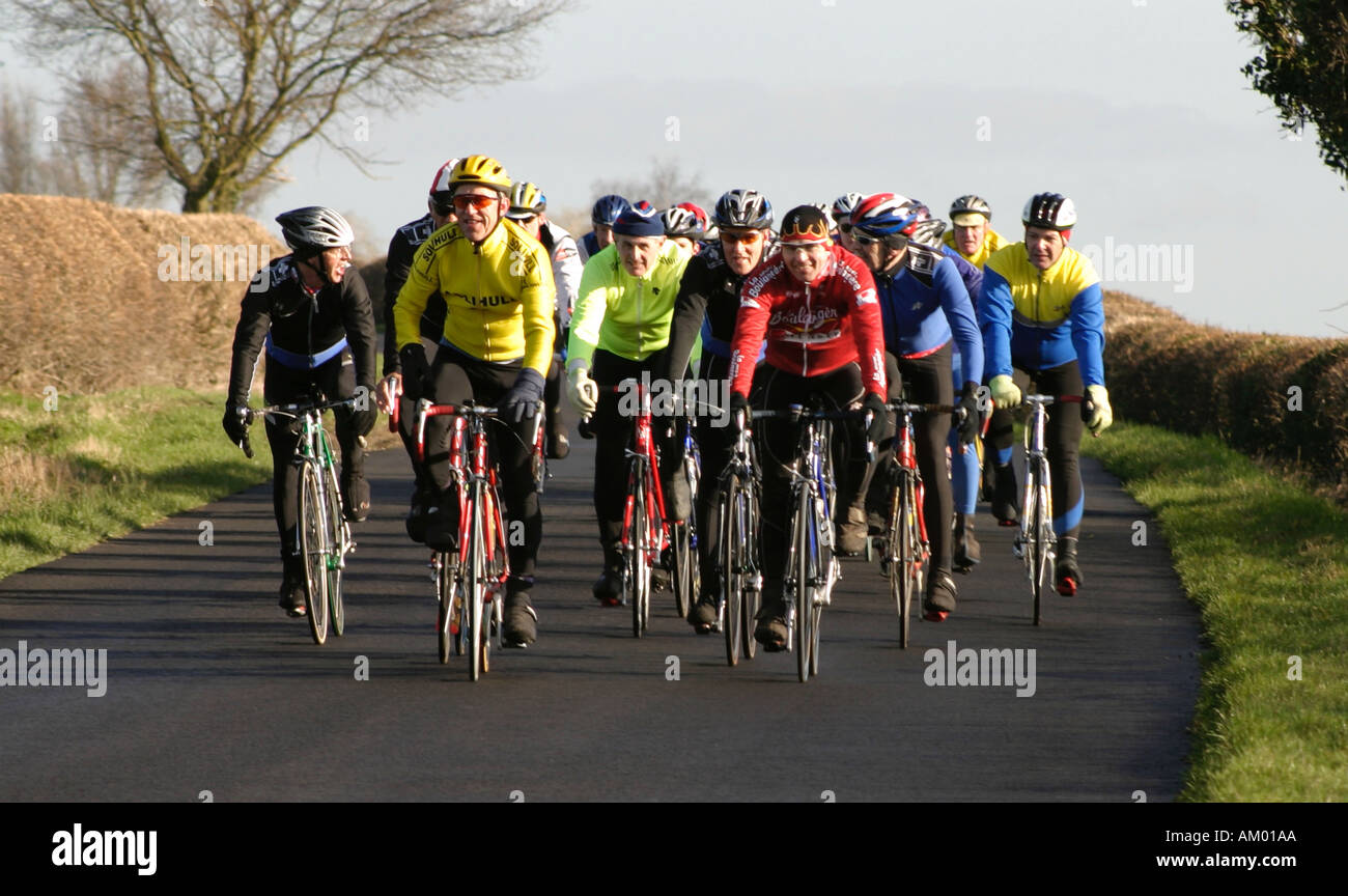 Bunch of cyclists from a cycle club enjoying a days riding on country ...