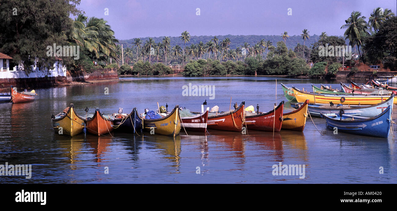 Fishing boats on the Baga river in Goa in the South of India Stock ...