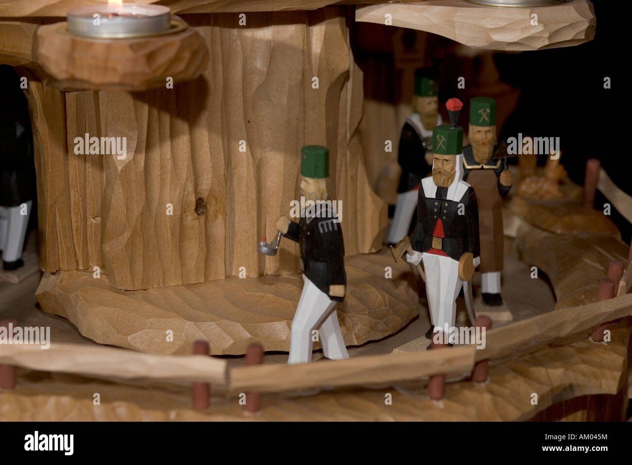 Hand carved miners in a christmas pyramid Stock Photo - Alamy