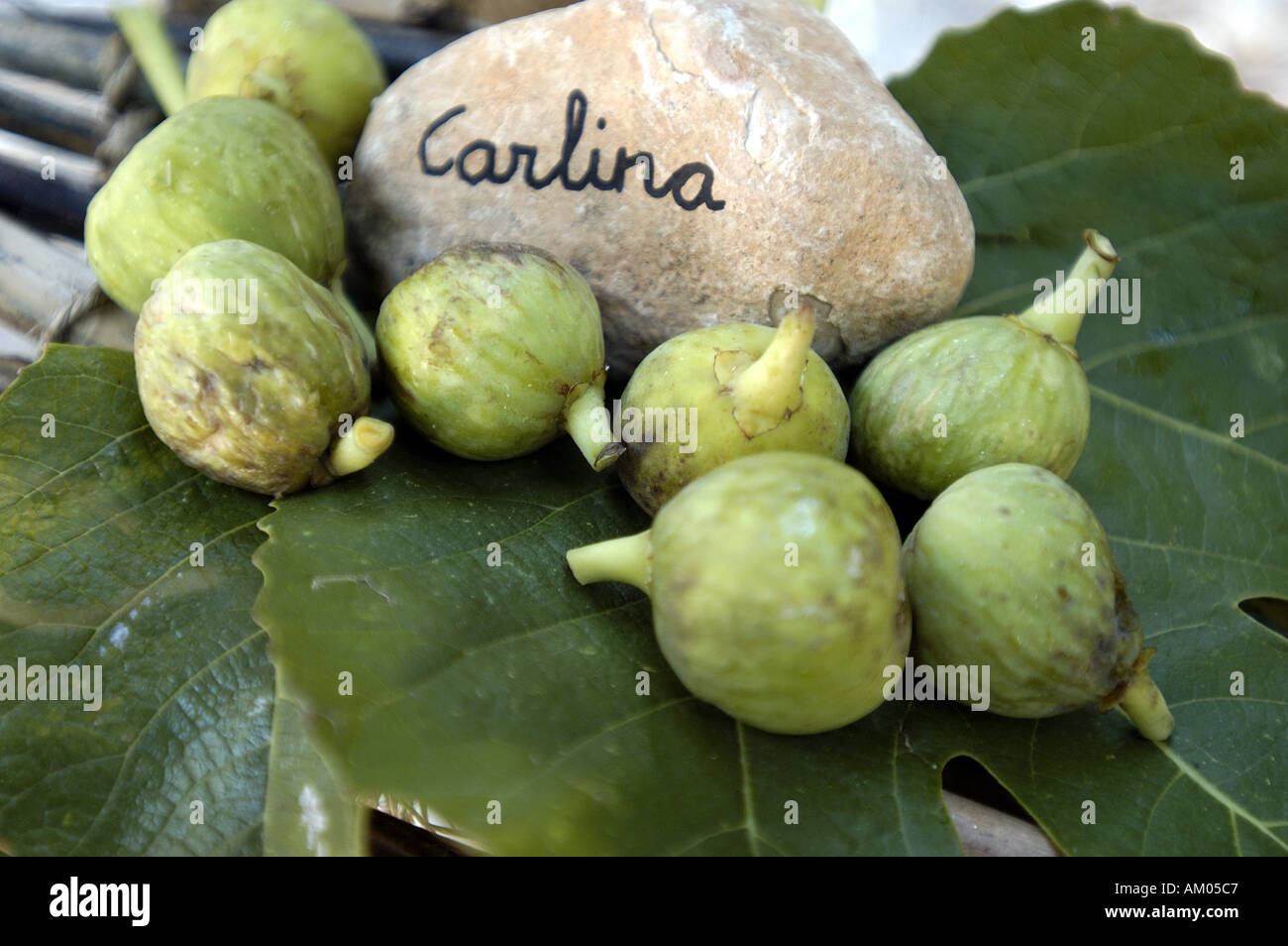 Various types of Figs on display at an outdoor stand Stock Photo - Alamy