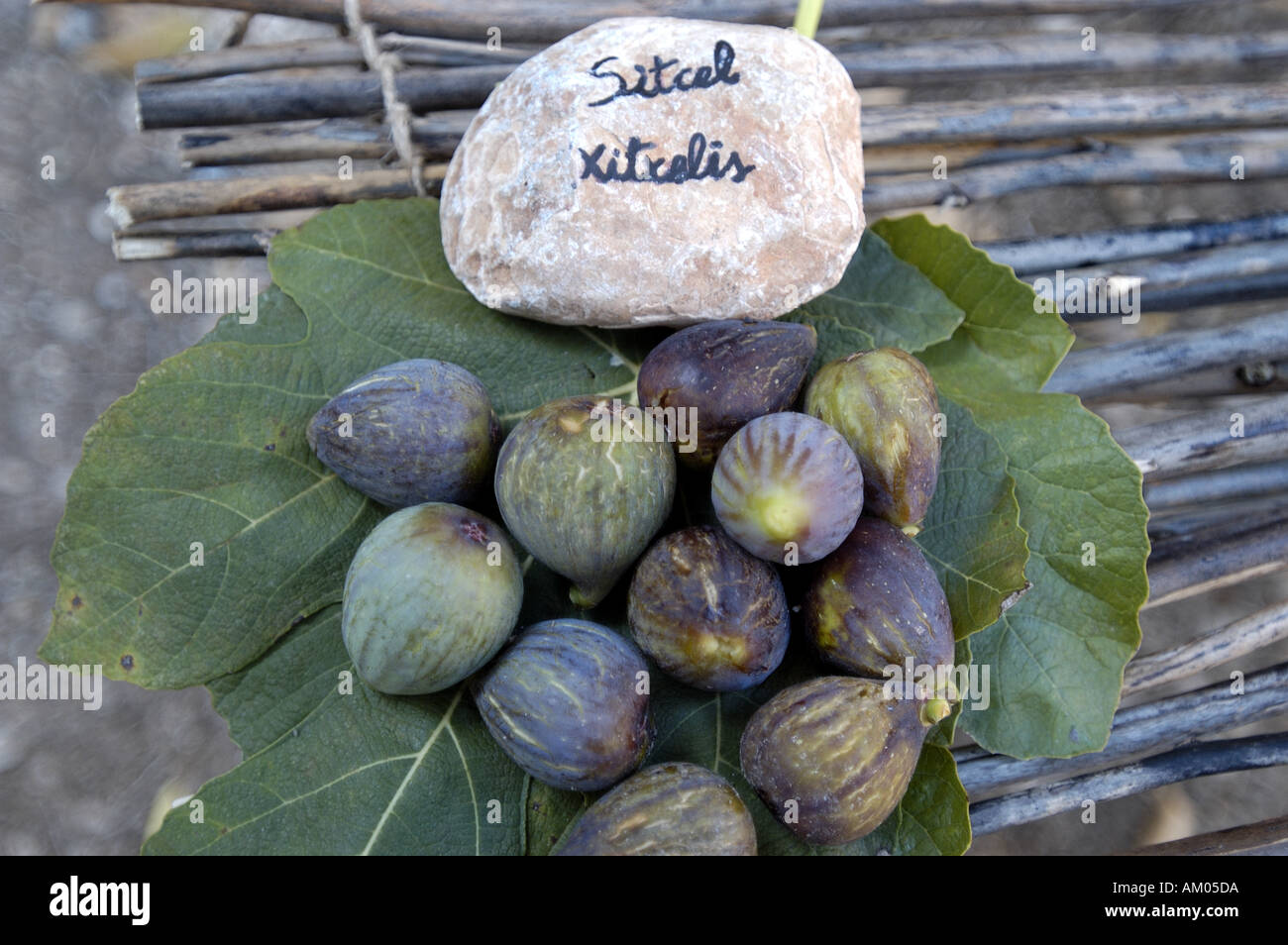 Various types of Figs on display at an outdoor stand Stock Photo - Alamy