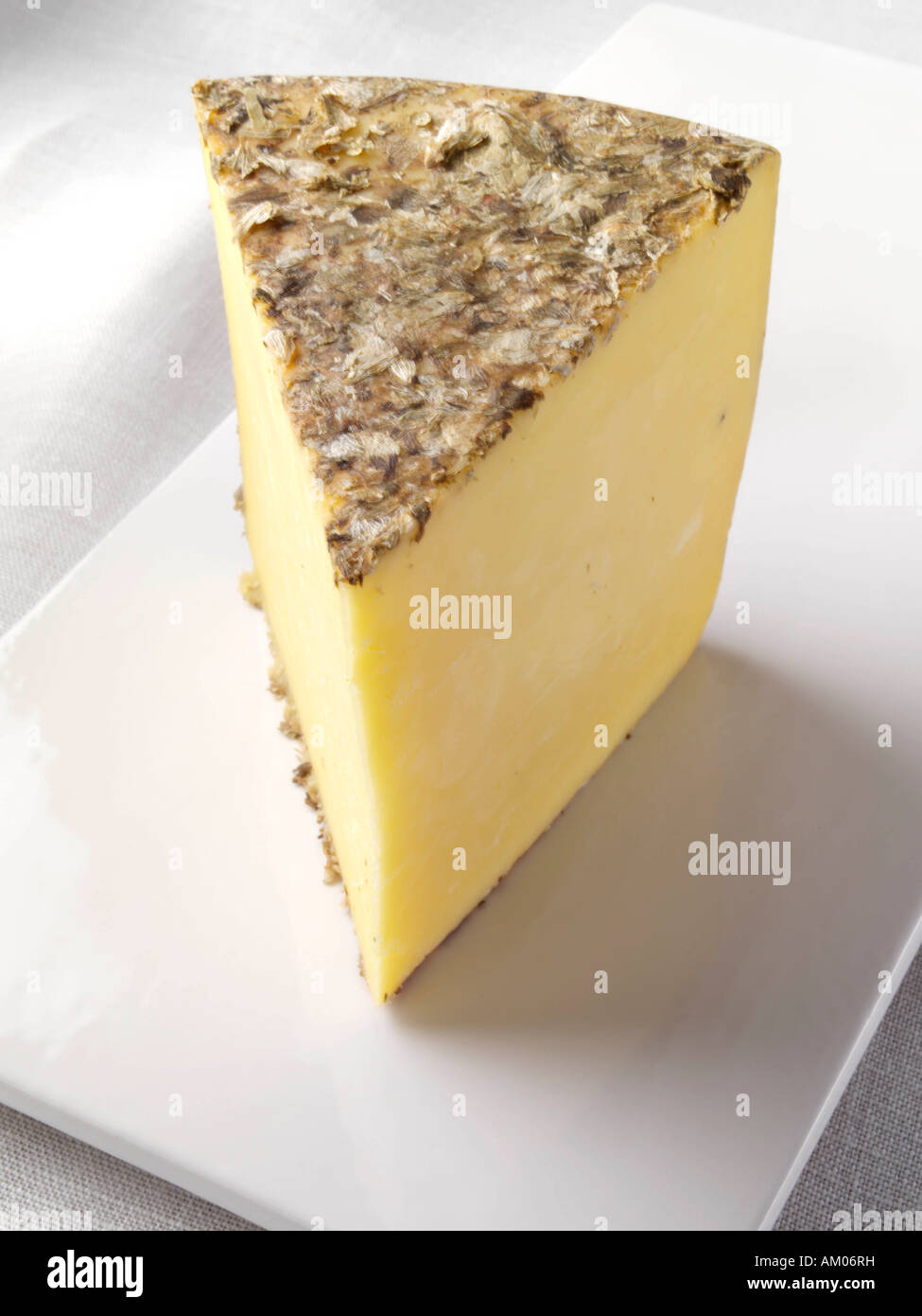 A wedge of Hereford Hop Cheese editorial food Stock Photo - Alamy