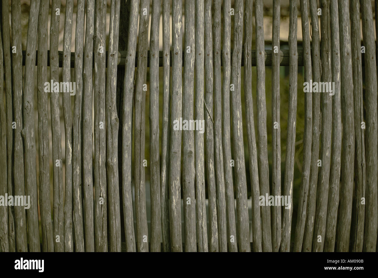 regular lines of wood twigs forming detail of old fence Stock Photo - Alamy