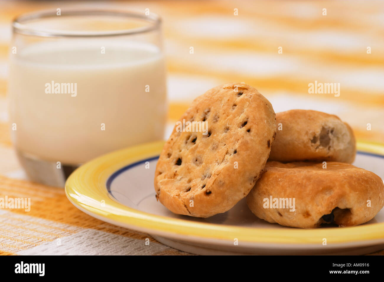 Milk and cookies Lancashire eccles cakes Stock Photo - Alamy
