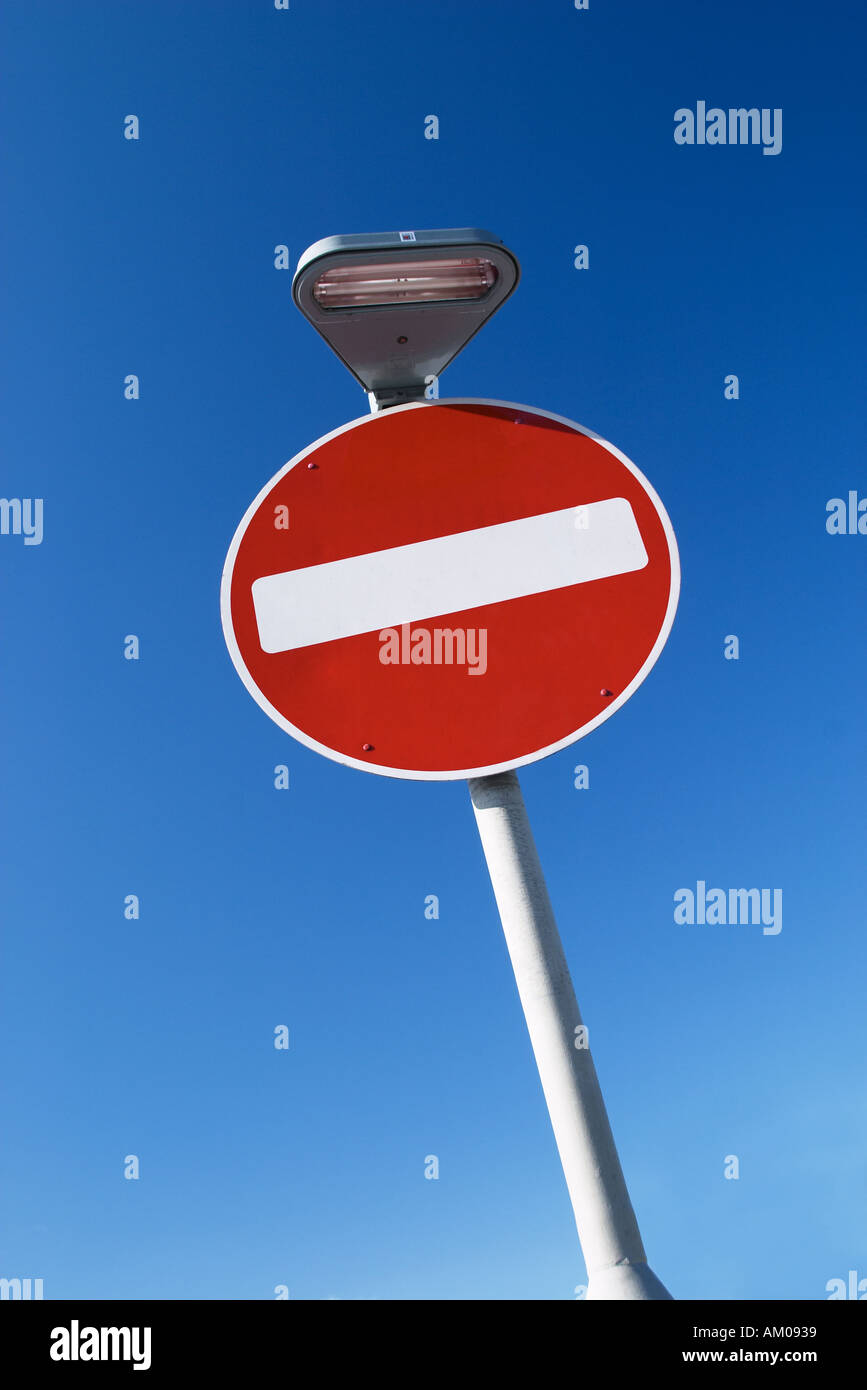 British roads no entry sign against blue sky Stock Photo - Alamy