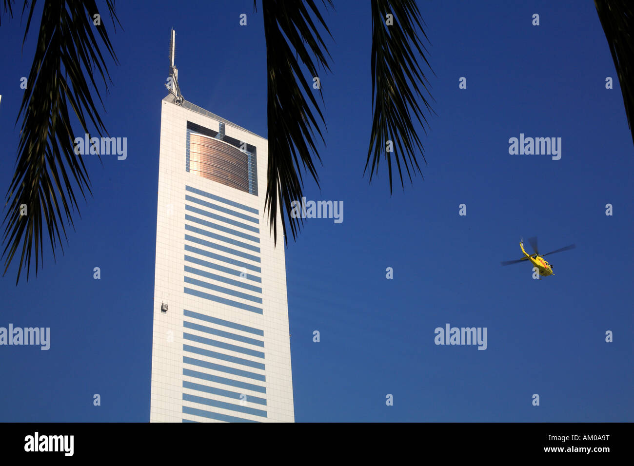 United Arab Emirates, Dubai, helicopter flying over one of the two ...