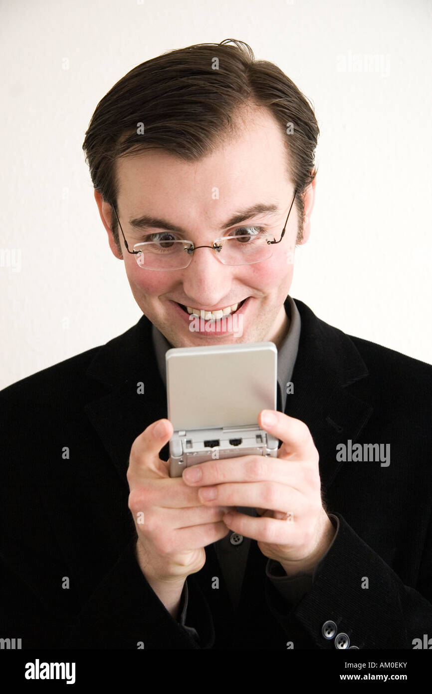 Business man playing video game Stock Photo - Alamy