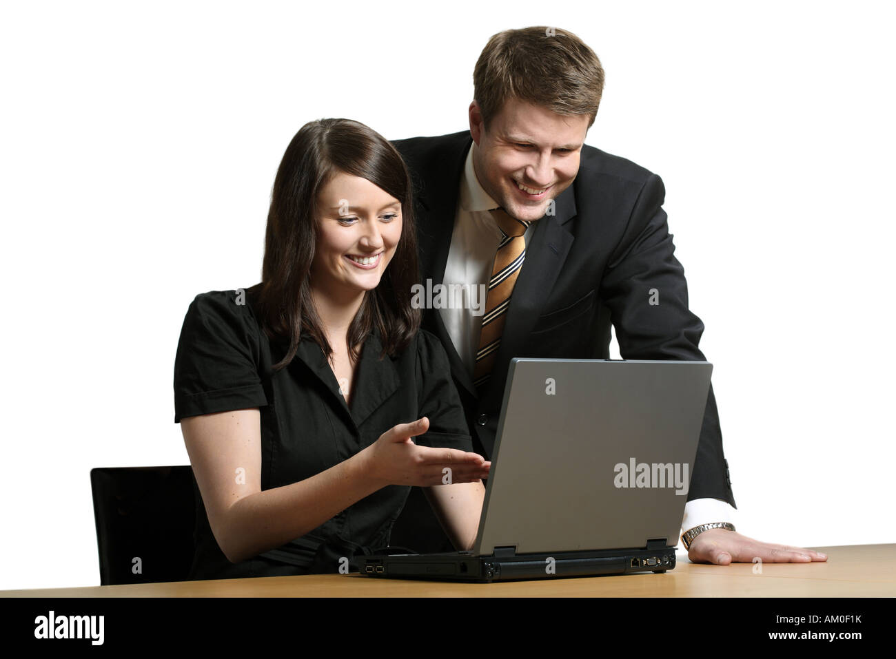 Man and woman with computer Stock Photo - Alamy