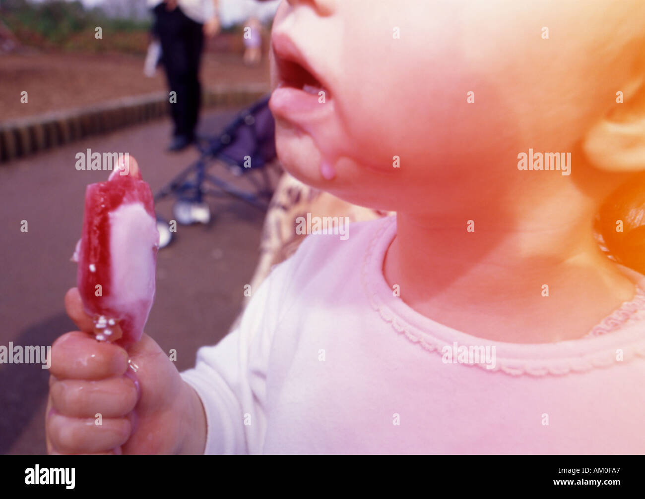 child with melted lolly Stock Photo - Alamy