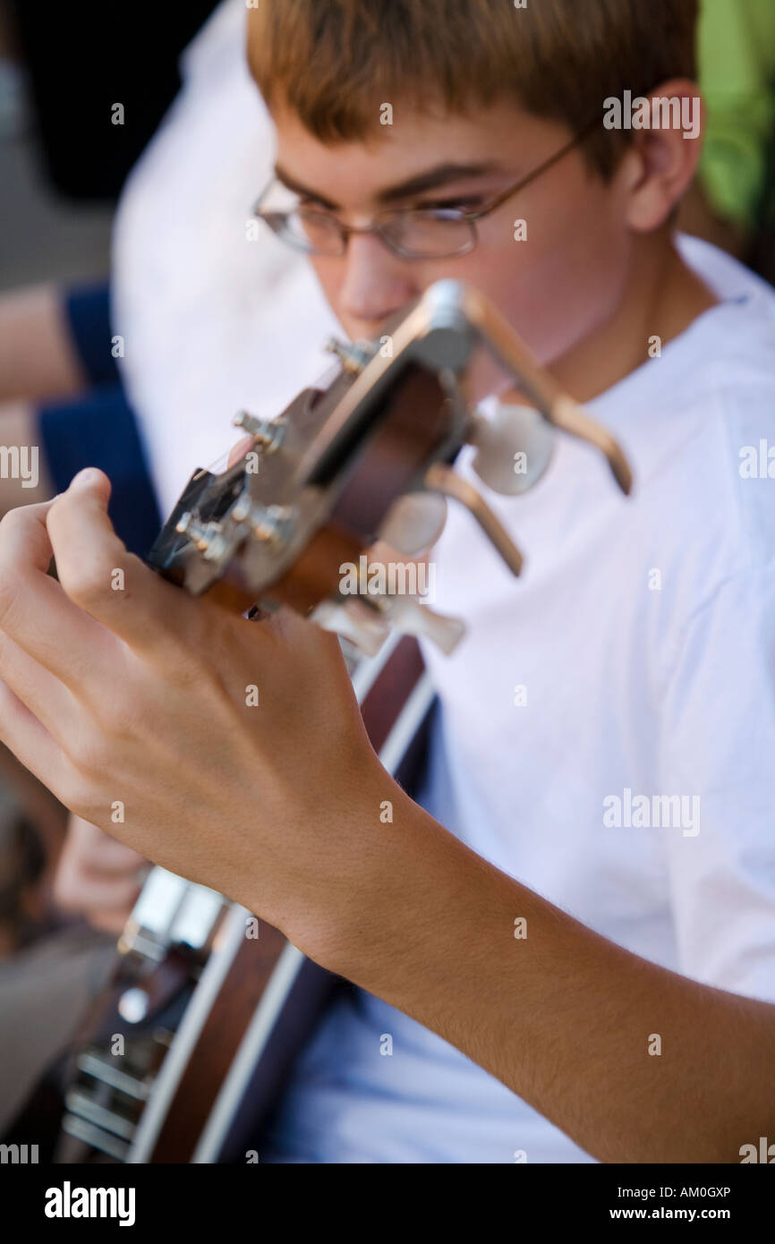 ILLINOIS Galena Teenage boy play banjo outdoors Stock Photo - Alamy