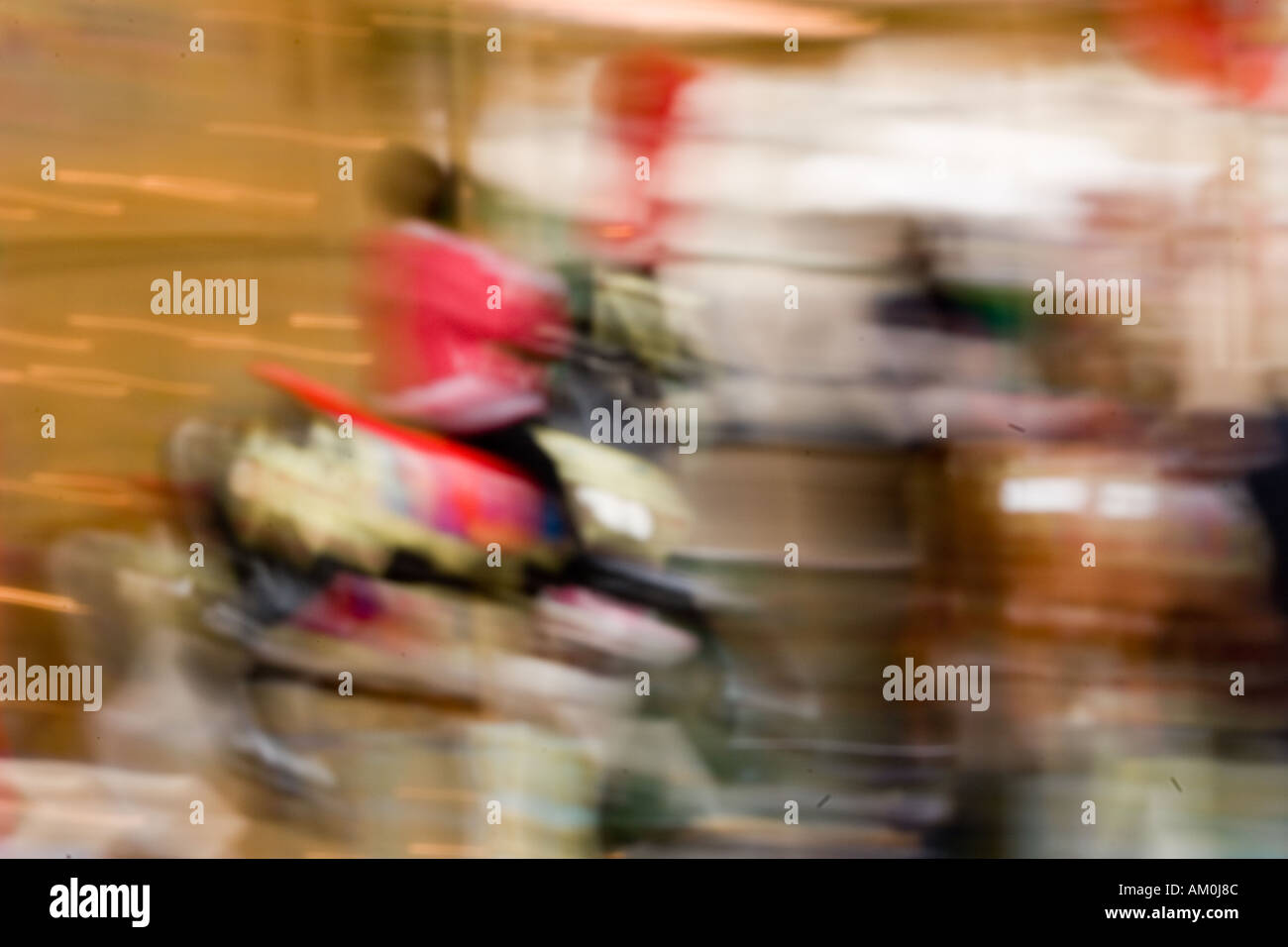 Kids playing on a merry go round hi-res stock photography and images ...
