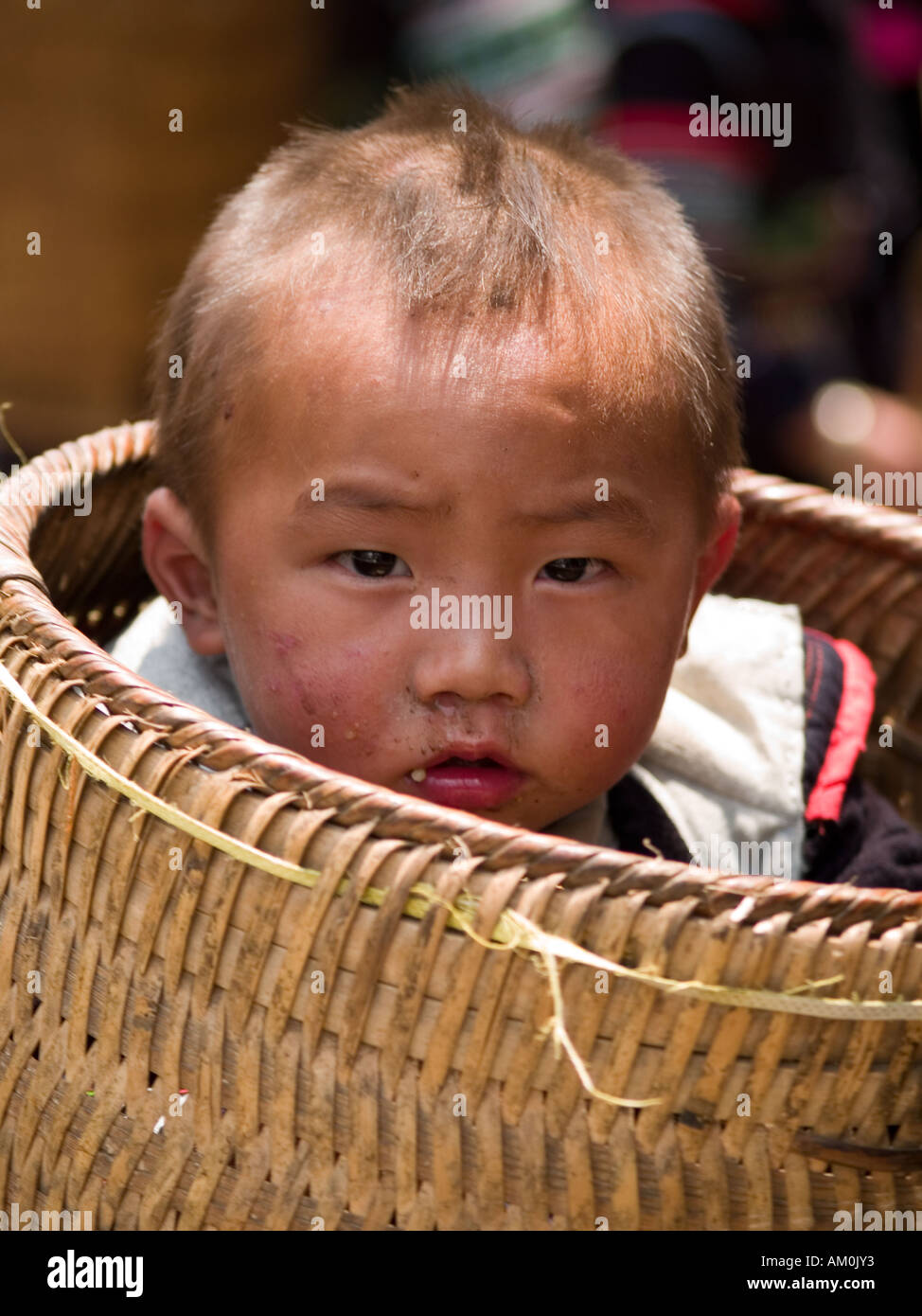 Boy in a basket Stock Photo - Alamy