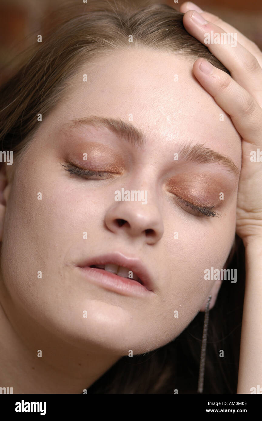 Woman showing signs of stress hi-res stock photography and images - Alamy