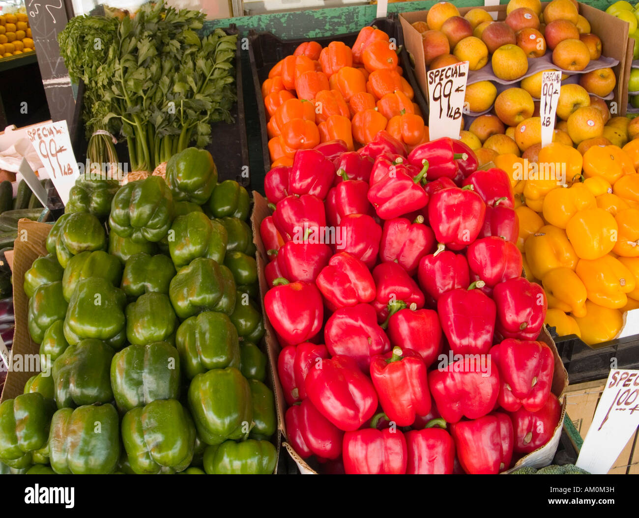 Colourful and juicy peppers being sold outside a fruit and vegetable ...