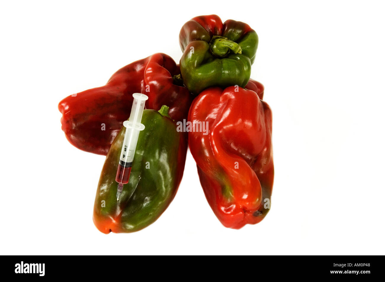 syringe in a peppers gm ogm food genetic modificarion genetically ...