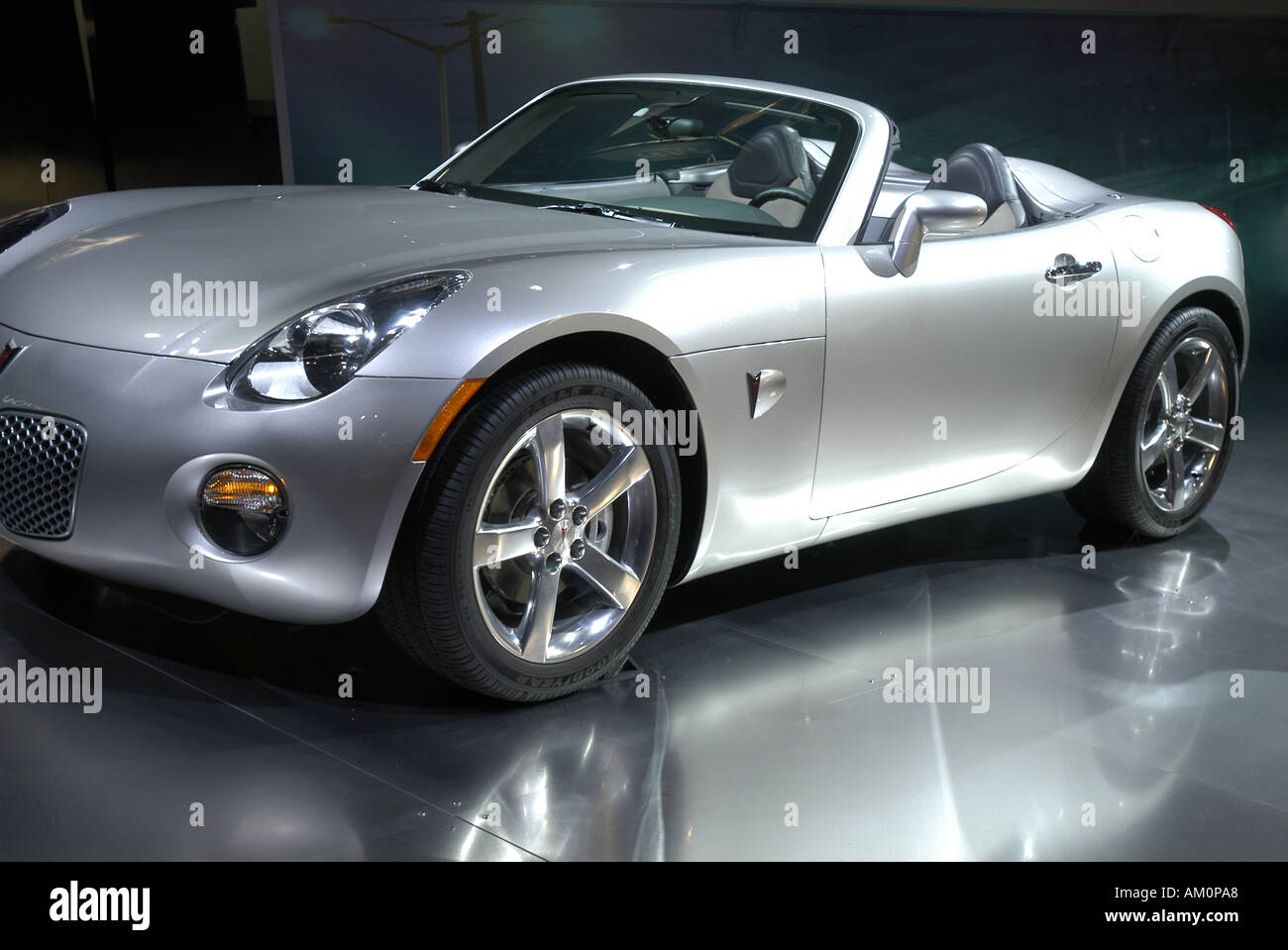 Sports car silver car convertible soft top frog eye wheels wheel trim ...