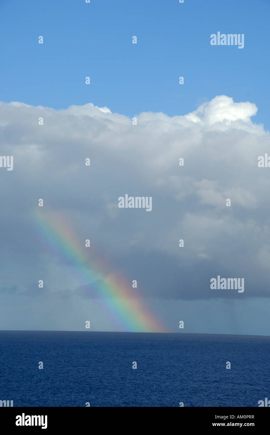 Caribbean scenic with rainbow over the islands hi-res stock photography ...