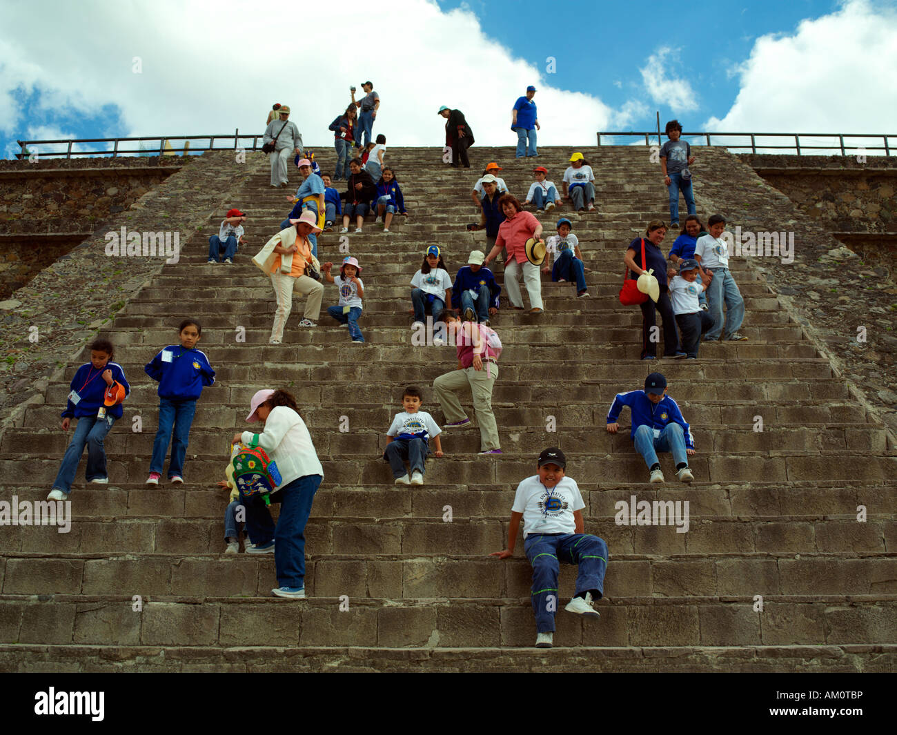 A large group of children with teachers exploring the ancient Aztec ...