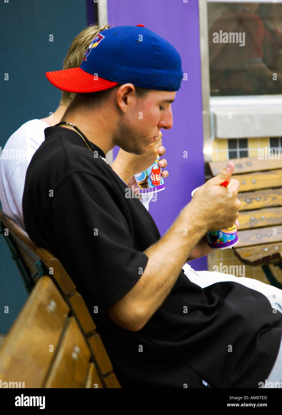 Caucasian teen boy takes a break at niagara falls hi-res stock ...