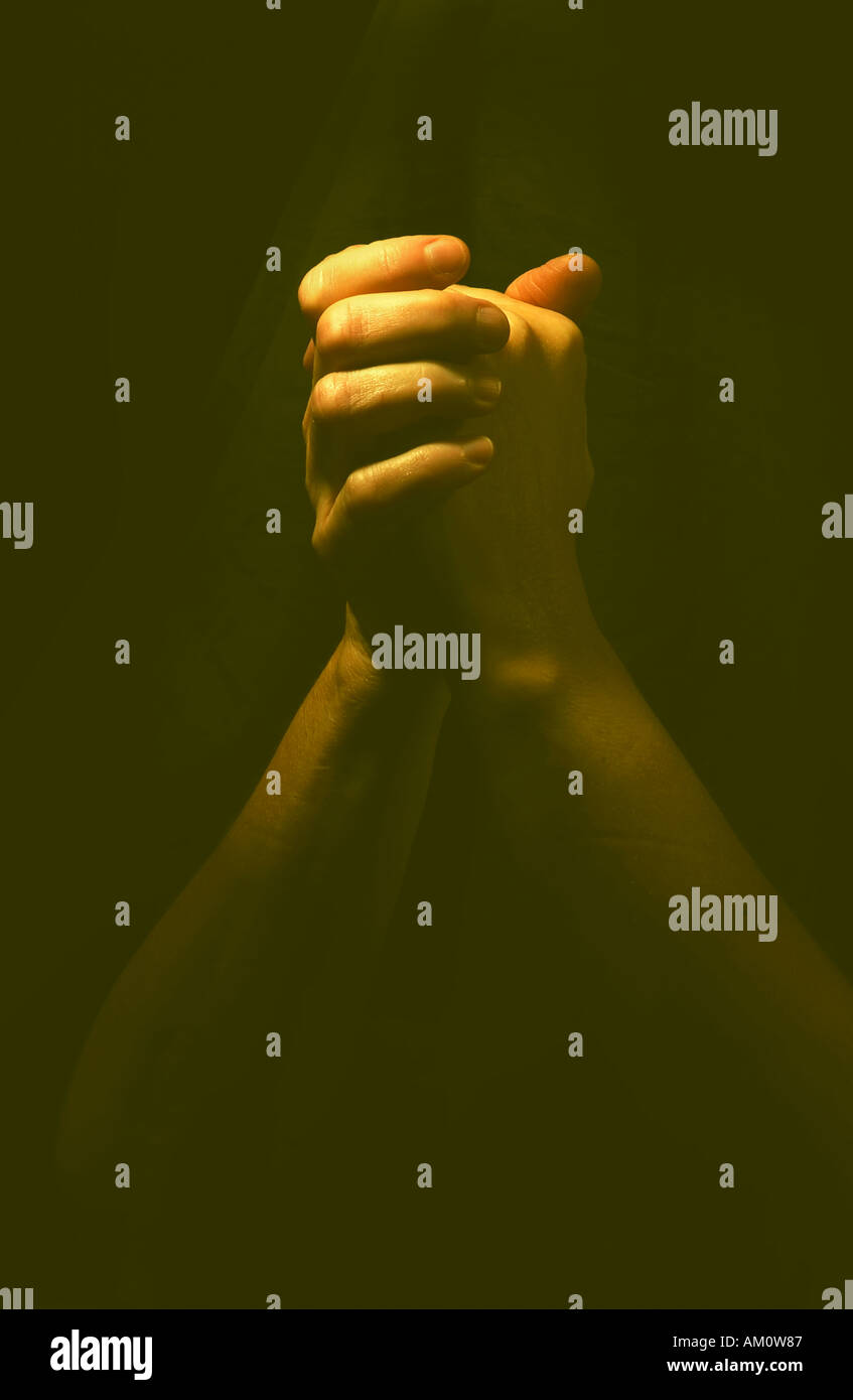 Stock photo of Hands clasped in prayer Stock Photo - Alamy