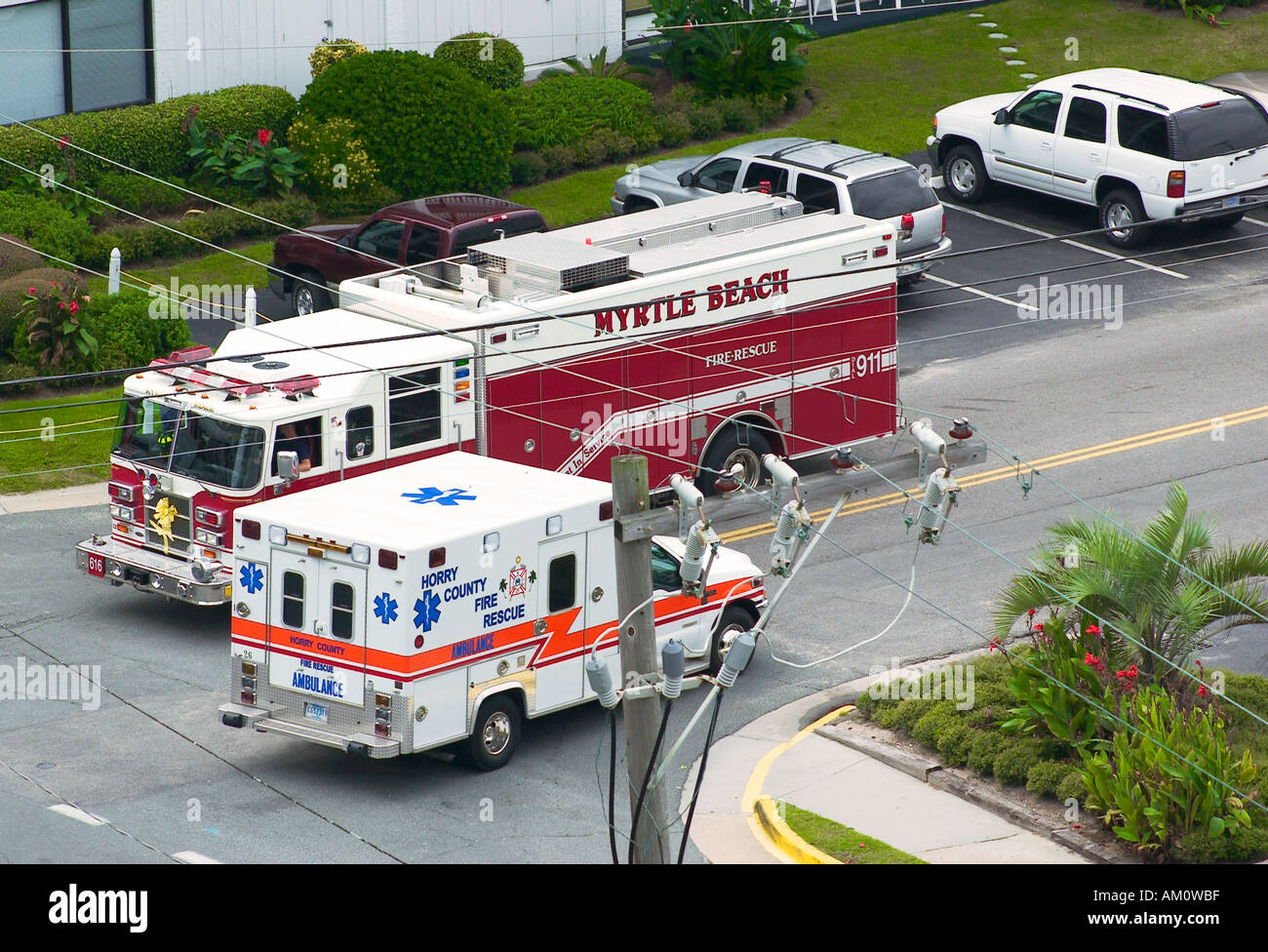 Overhead view of fire engine and ambulance responding to an emergency ...