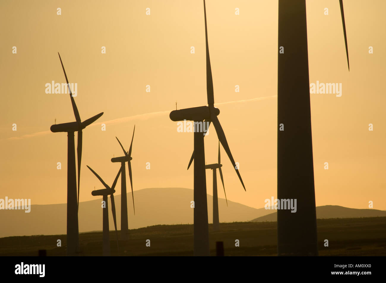 Npower wind farm - 6 turbines in silhouette at Carno Powys mid wales in ...