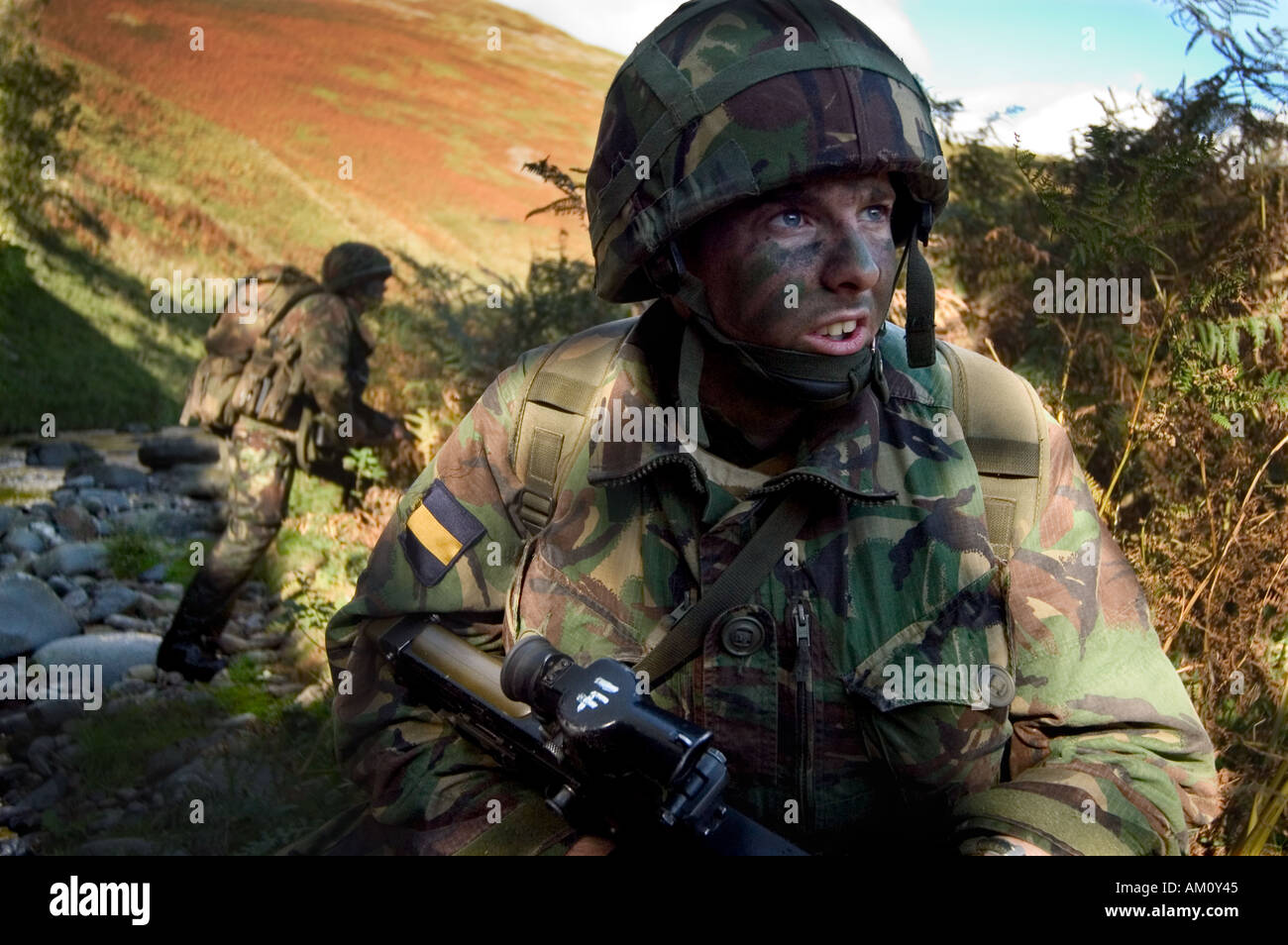 Territorial Army soldiers of the Royal Rifle Volunteers exercising on ...