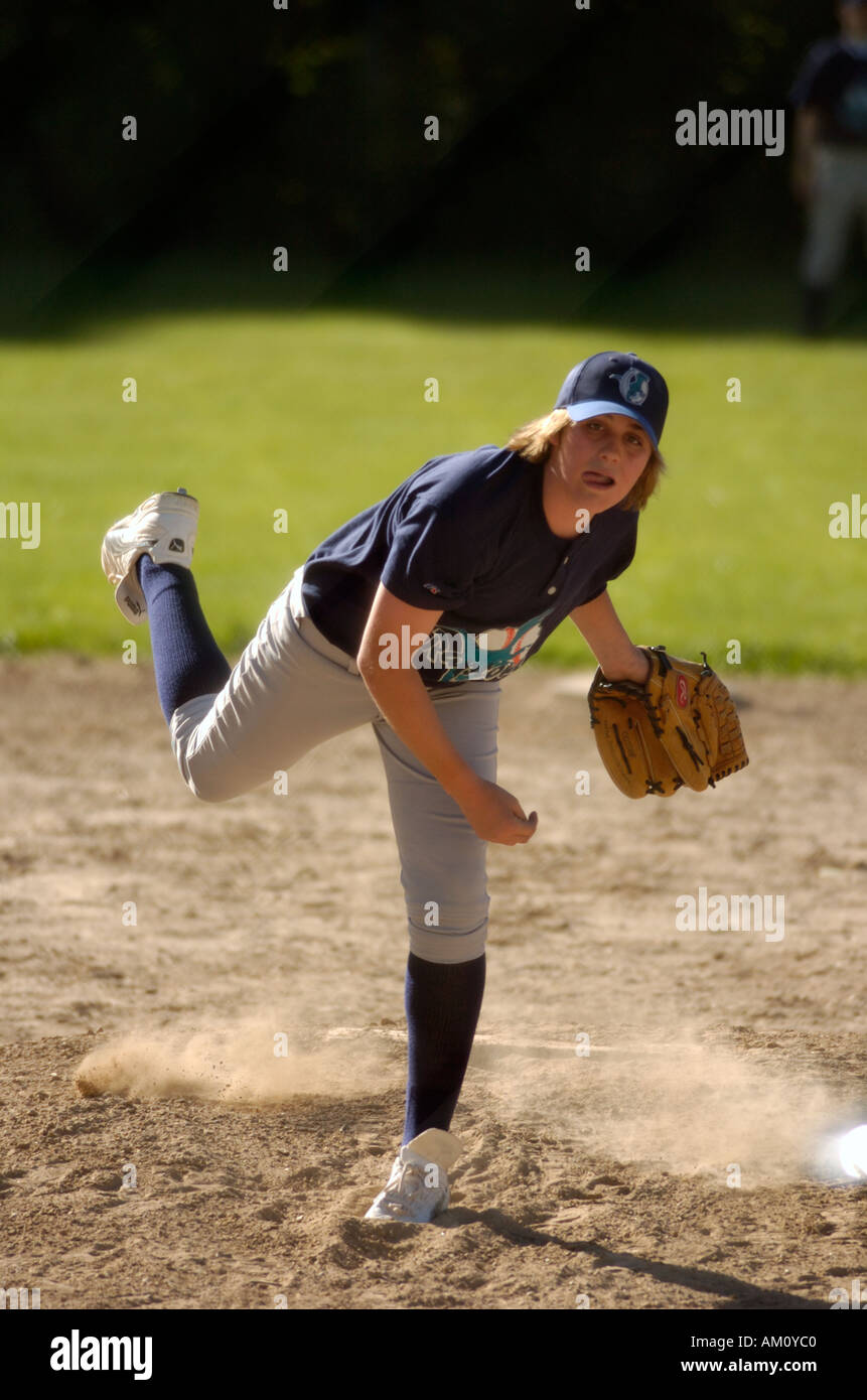 Basball pitcher throwing ball Stock Photo - Alamy