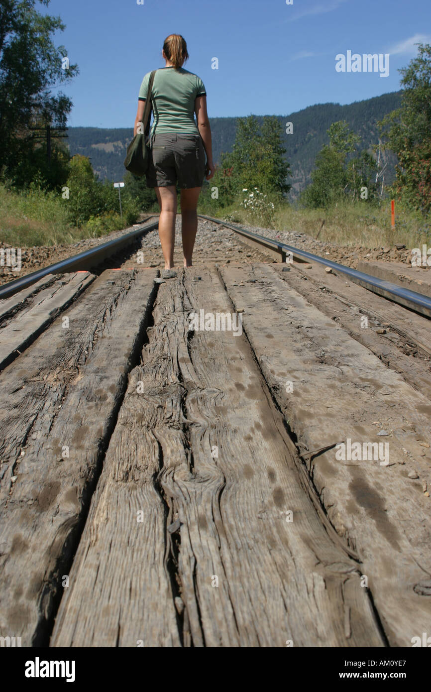 Girl walking on rail hi-res stock photography and images - Alamy