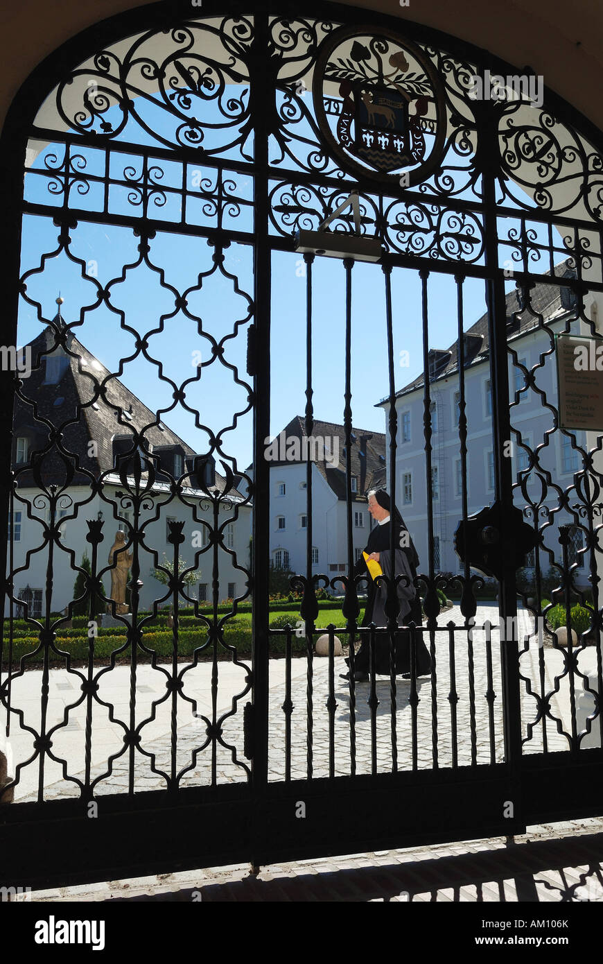 Metal gate at the convent Frauenwoerth, Fraueninsel on lake Chiemsee ...