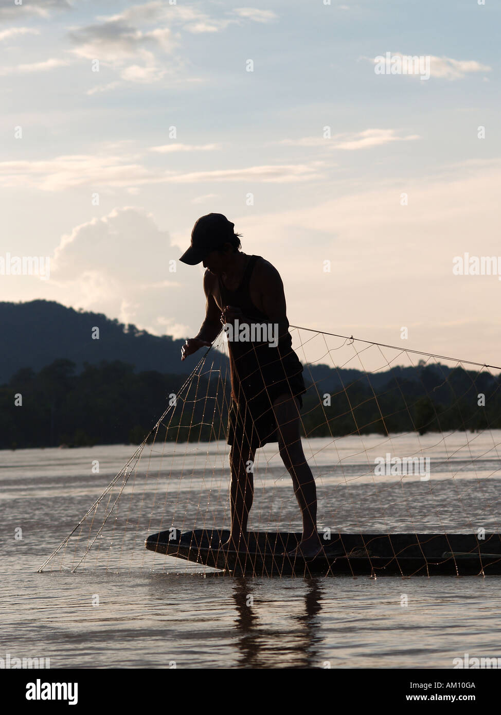 Fishing boats hauling in nets hi-res stock photography and images - Alamy