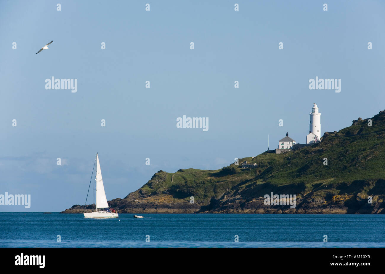 Lighthouse of Start Point, sailing boat in front, cornwall, England, UK ...