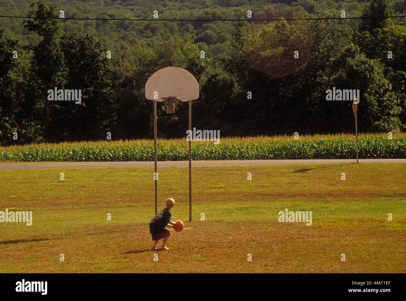 Boy playing Basketball Rural Iowa Stock Photo - Alamy