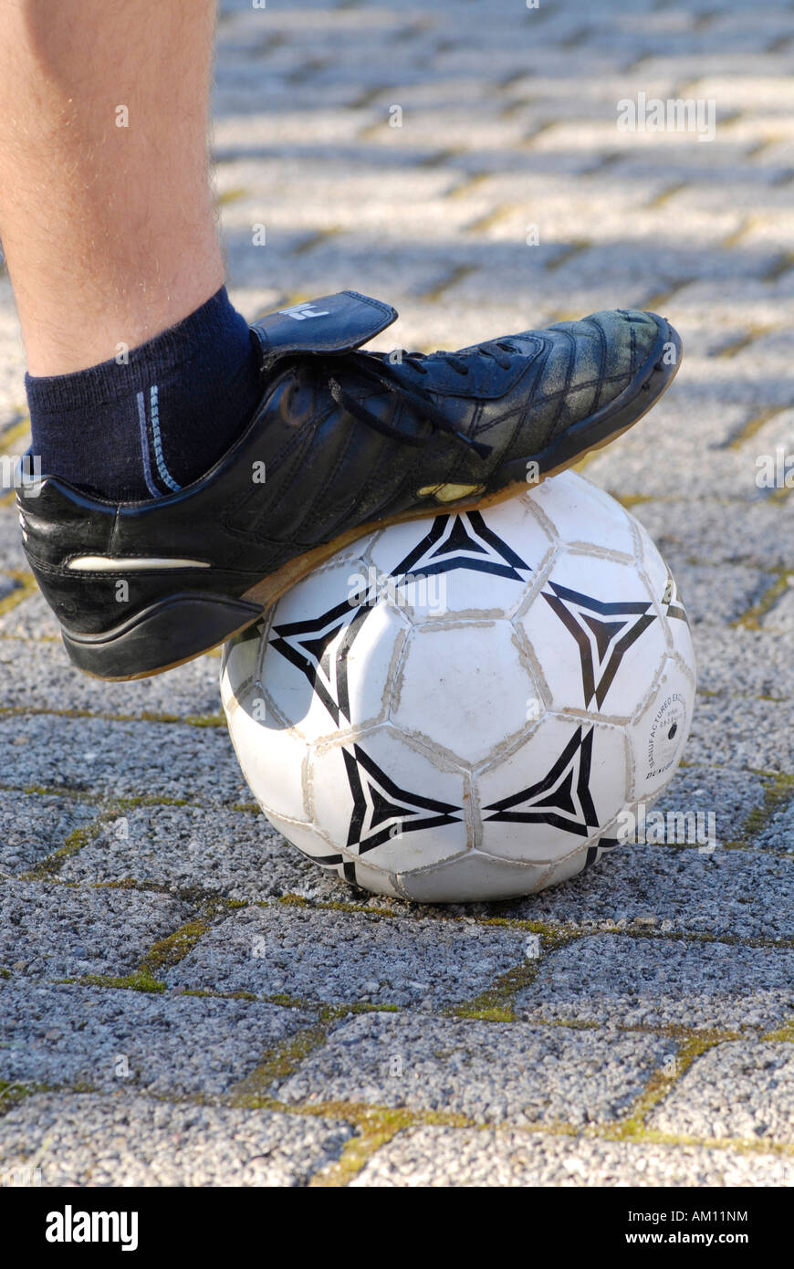 Foot and football Stock Photo - Alamy