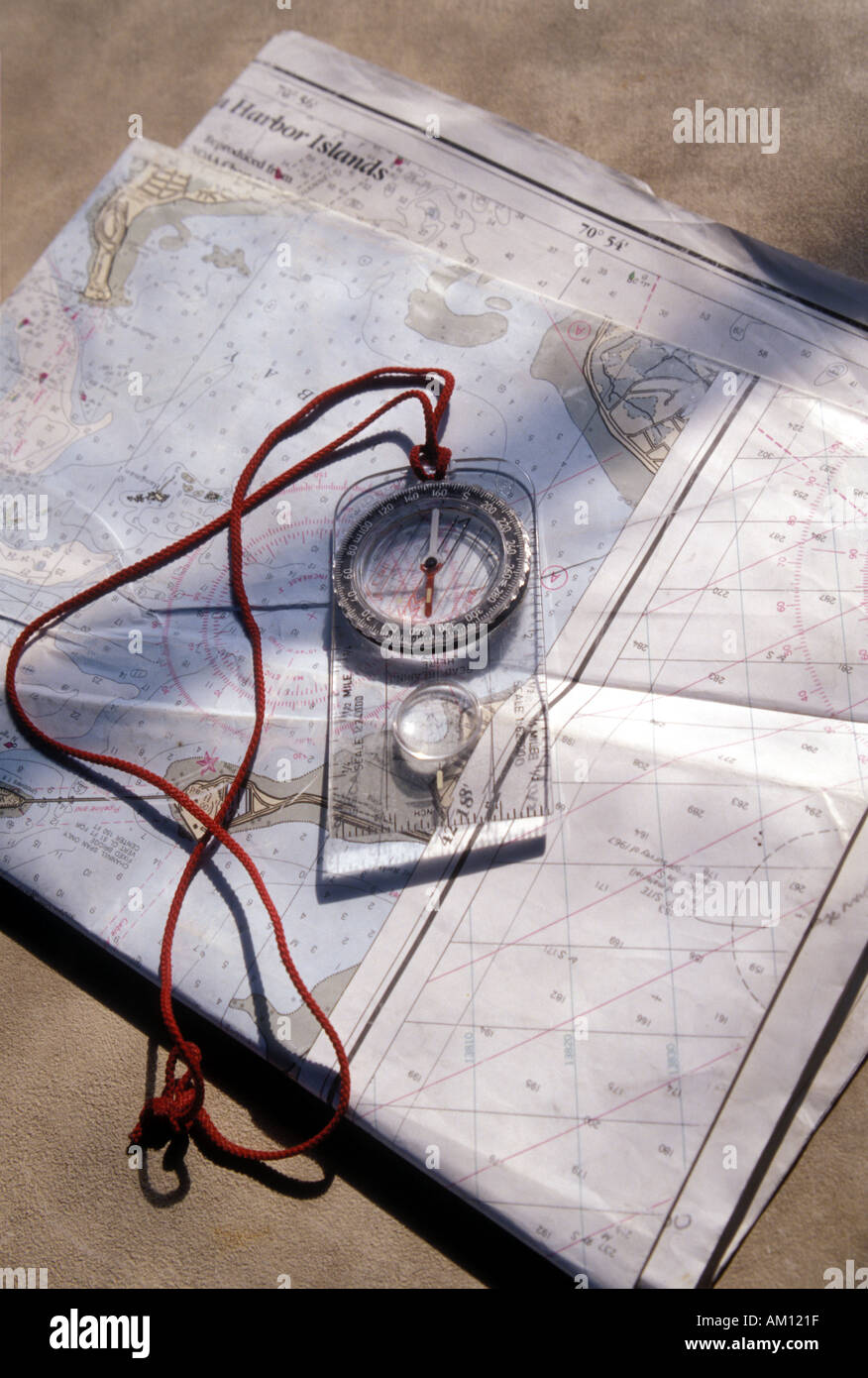 Compass and Map Stock Photo - Alamy