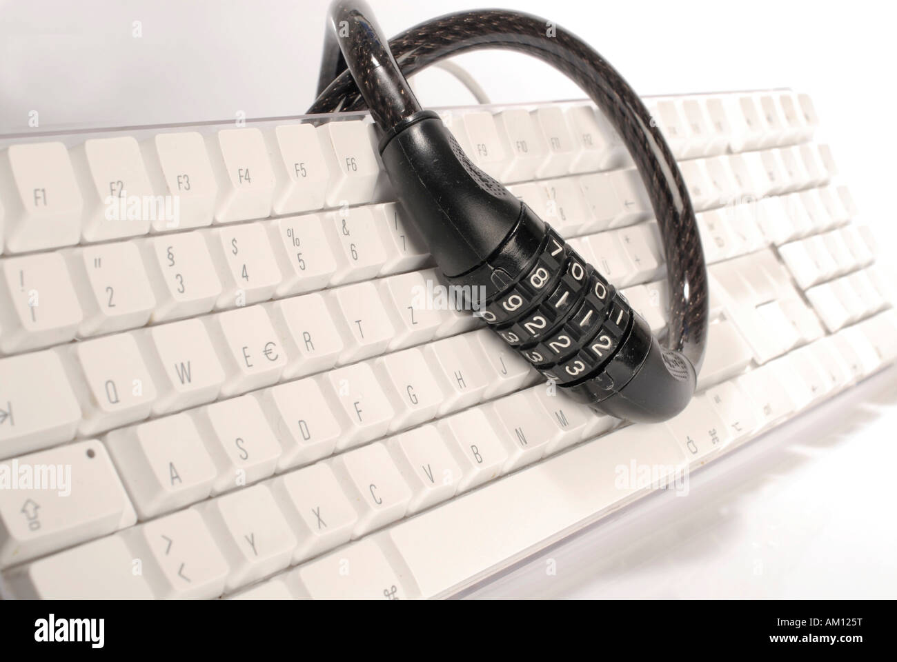 Computer keyboard and combination lock Stock Photo - Alamy