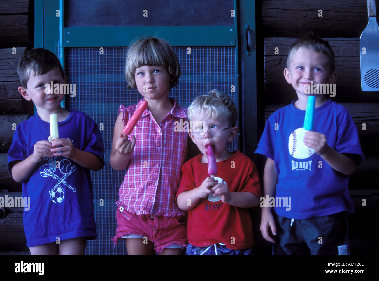 Kids Eating Popsicles Stock Photo - Alamy