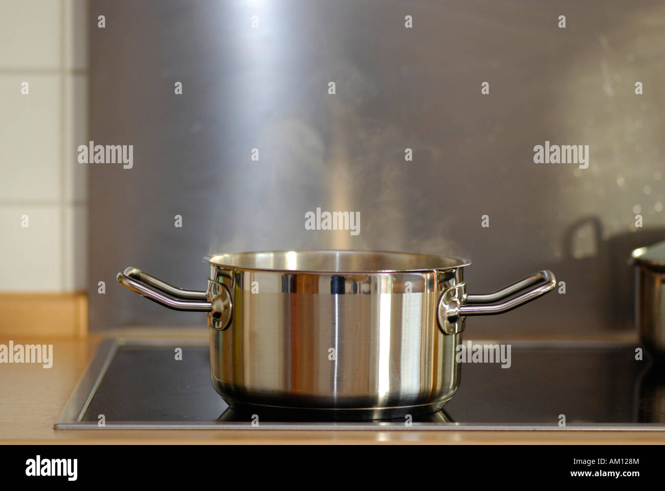 Steam rising out of cooking pot Stock Photo - Alamy