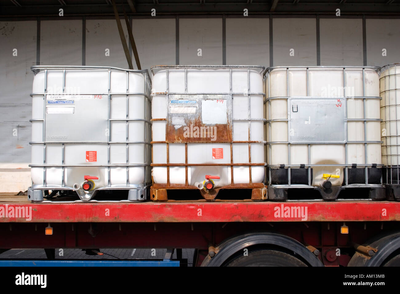IBC containers onboard a lorry Stock Photo - Alamy