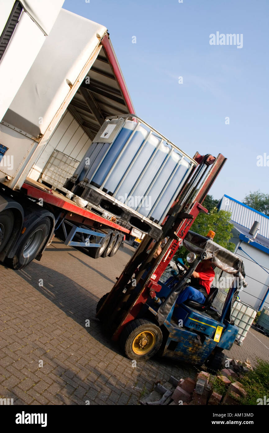 IBC containers onboard a lorry Stock Photo - Alamy