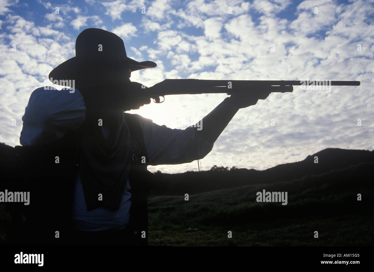 Cowboy with rifle hi-res stock photography and images - Alamy