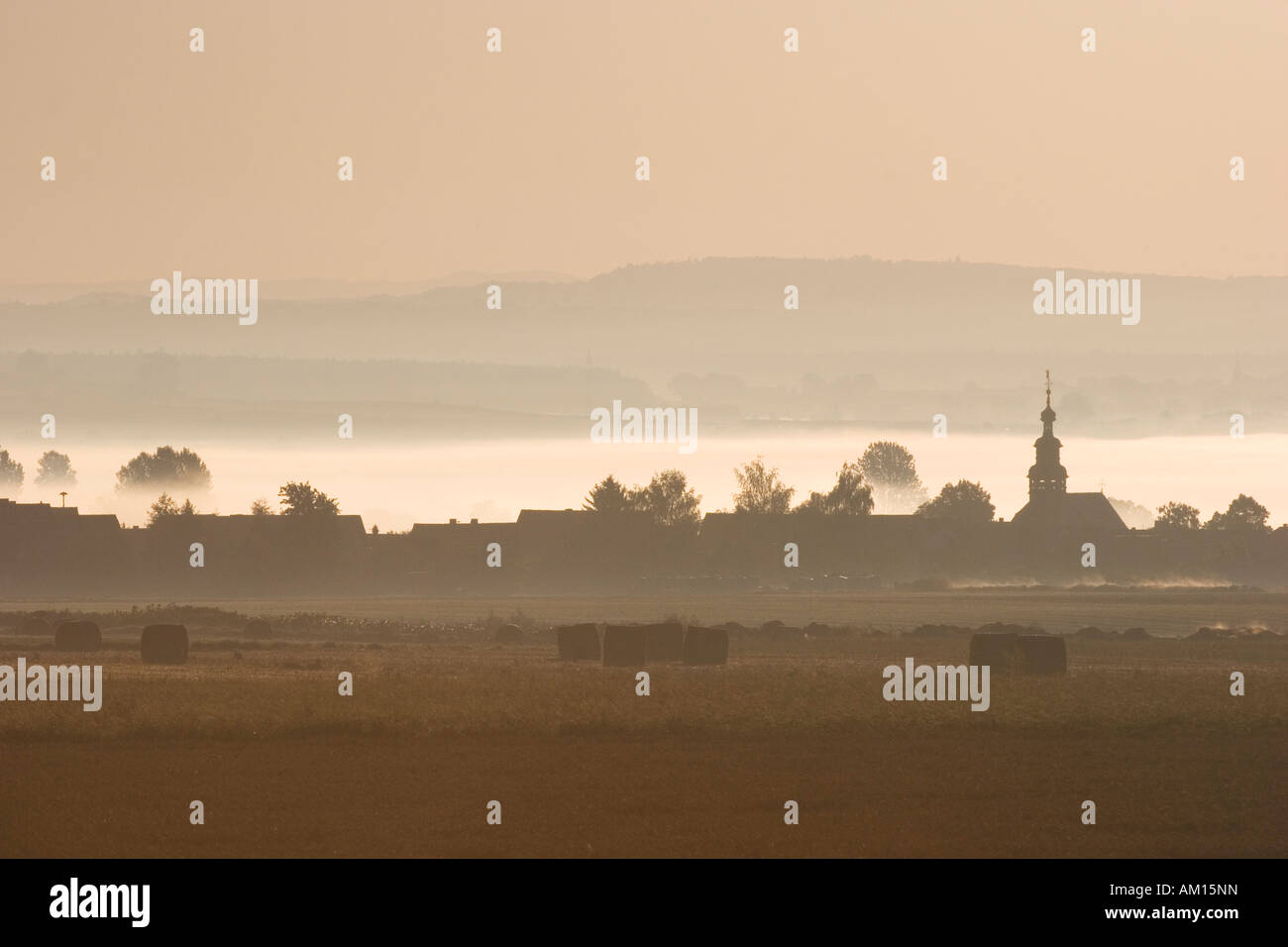 Village in morning fog, Rossdorf, Hesse, Germany Stock Photo - Alamy