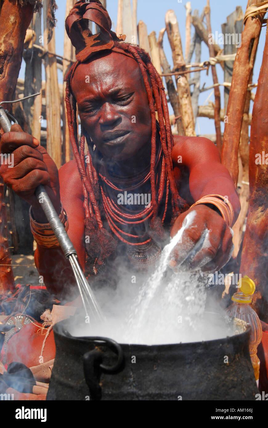 Cooking Himba women, Purros, Kaokoveld, Namibia Stock Photo - Alamy