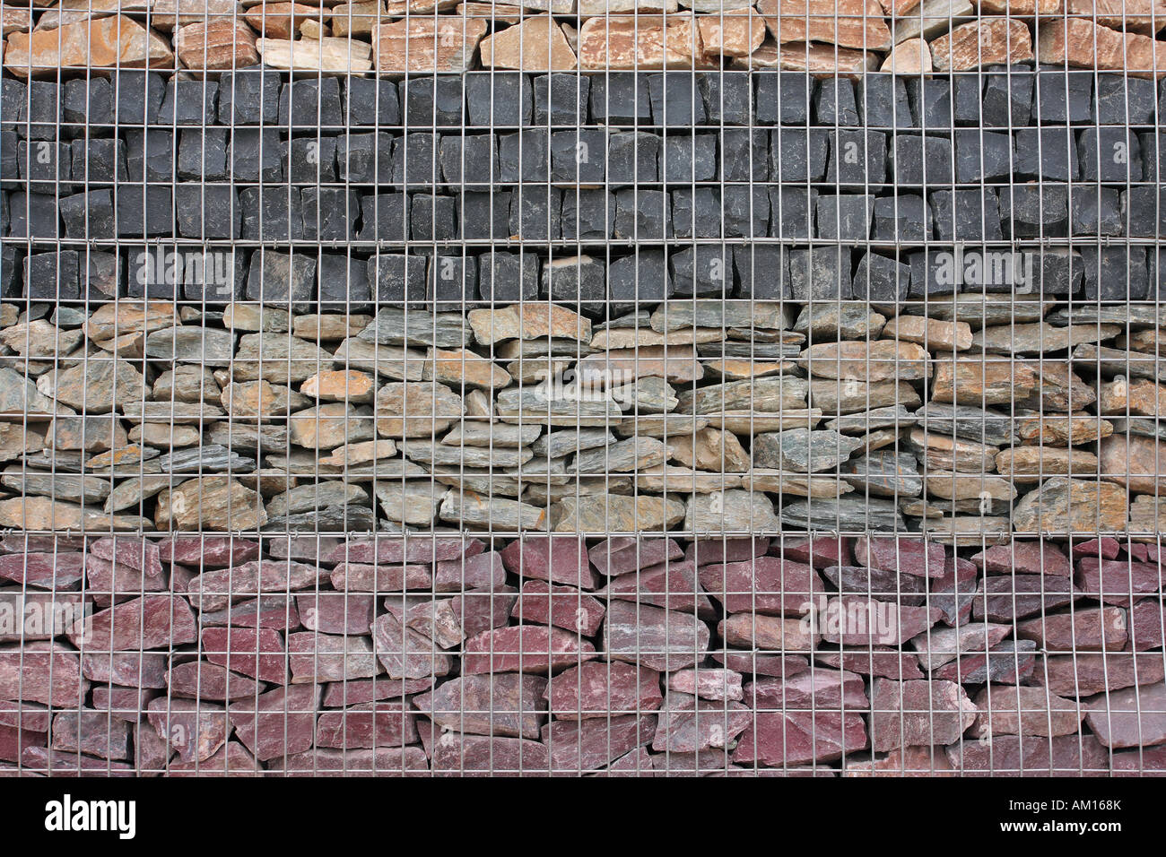 Barred colorful stone wall Stock Photo - Alamy