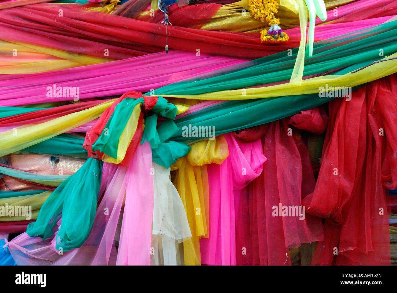 Tied cloths around the tree hi-res stock photography and images - Alamy