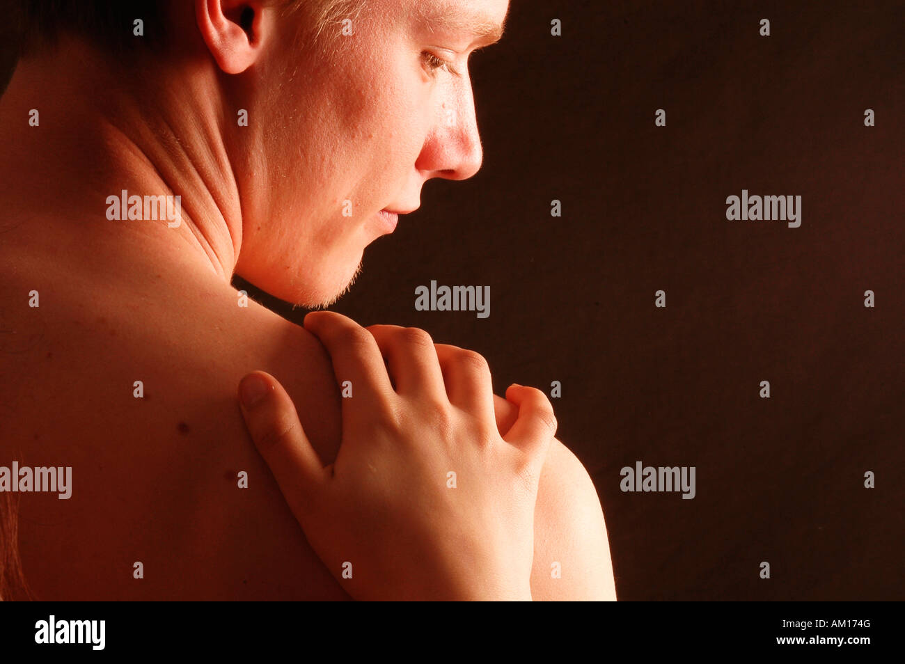 Hand in shoulder hi-res stock photography and images - Alamy